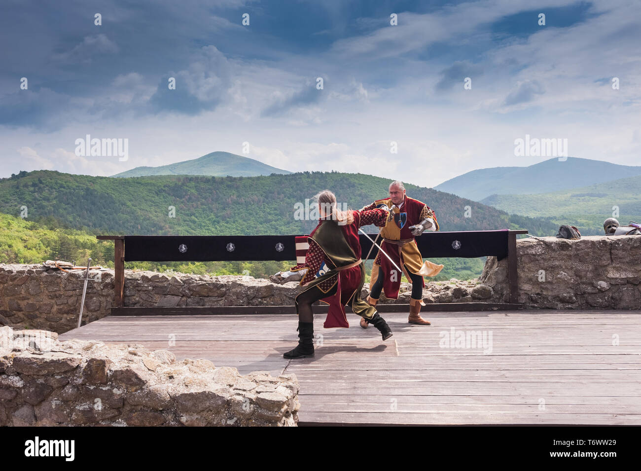 Knights fighting with long-swords in Castle Boldogkovaralja, Hungary ...