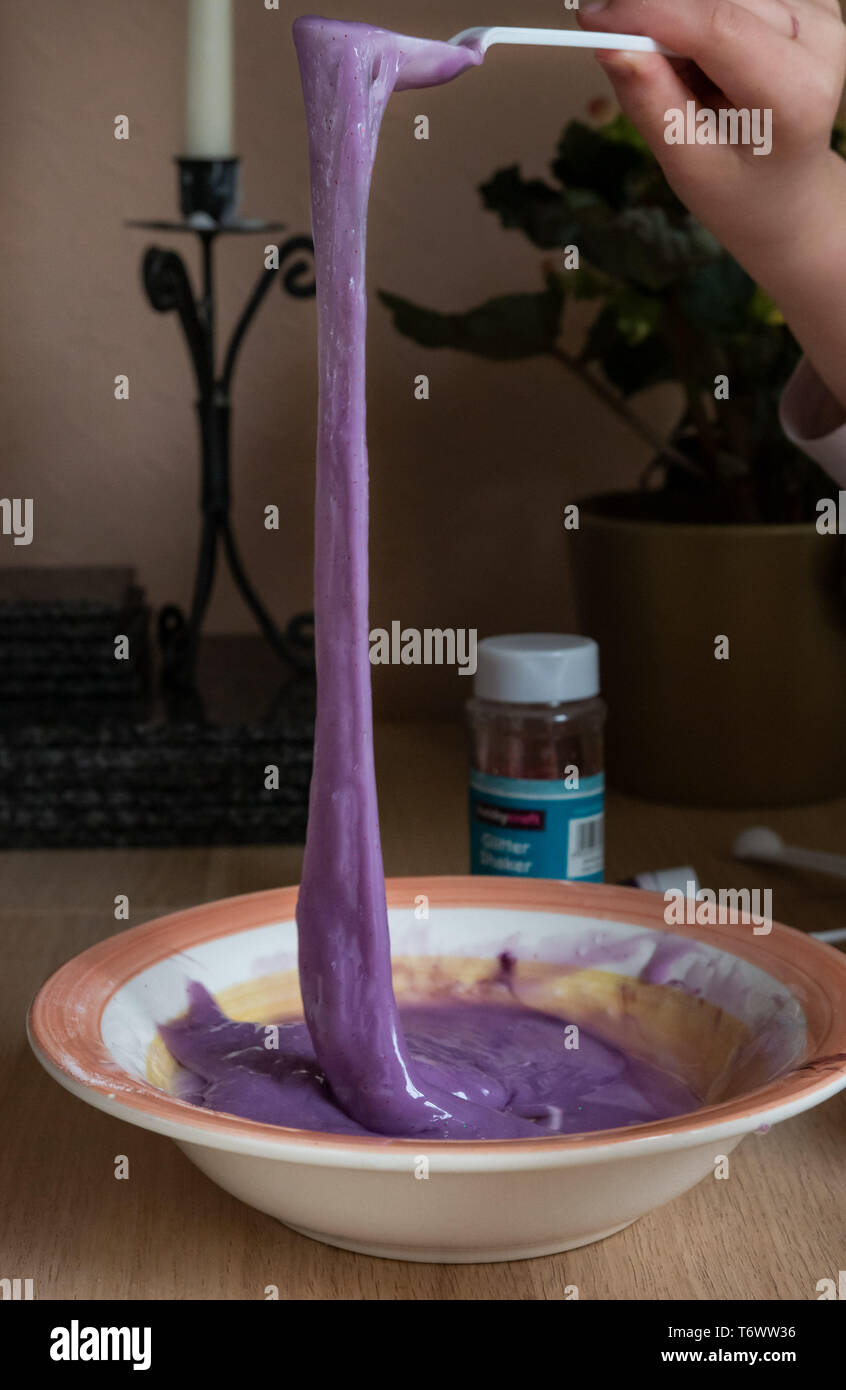 Child making slime hi-res stock photography and images - Alamy