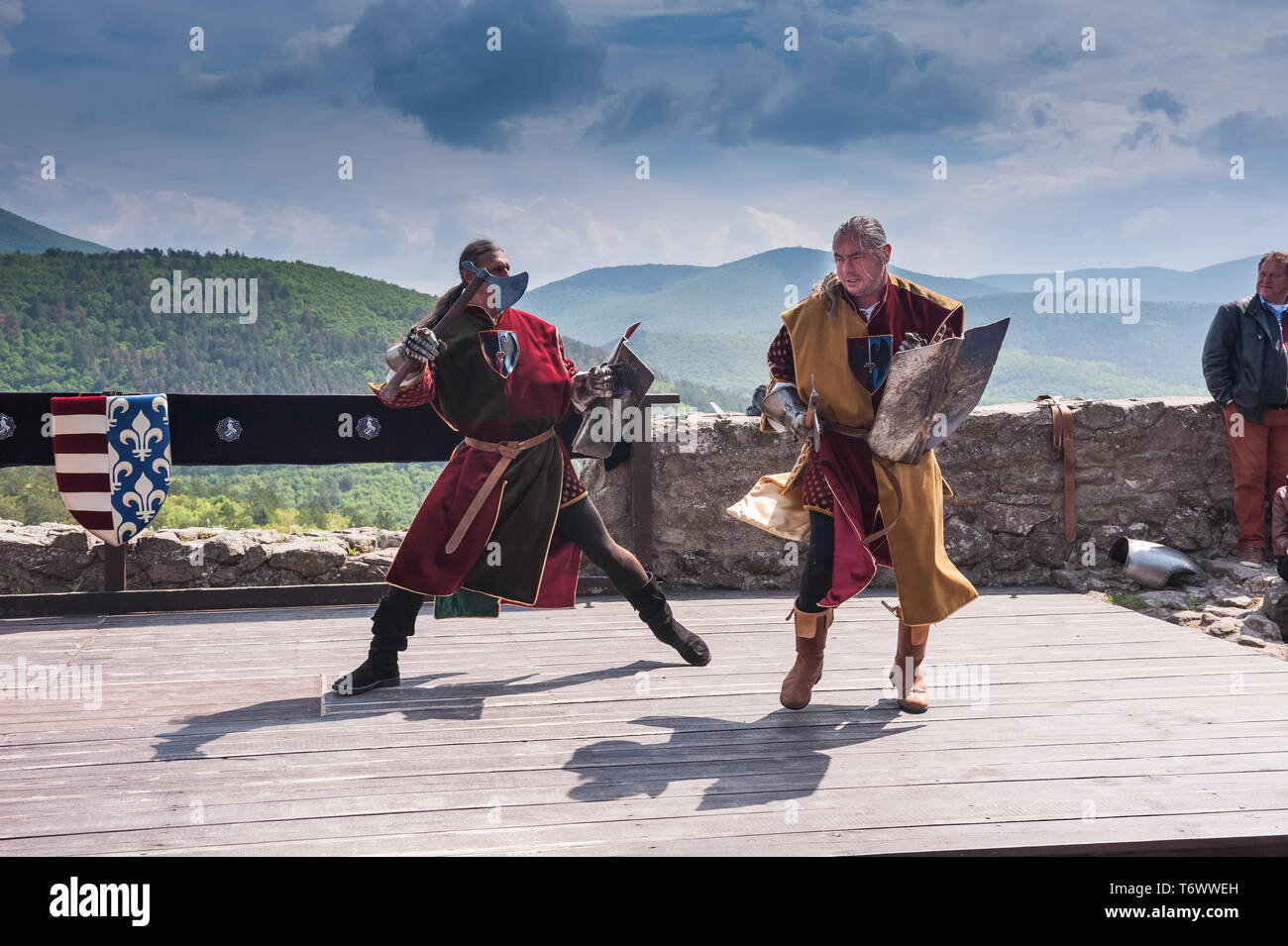 Knights fighting with axes in Castle Boldogkovaralja, Hungary Stock ...