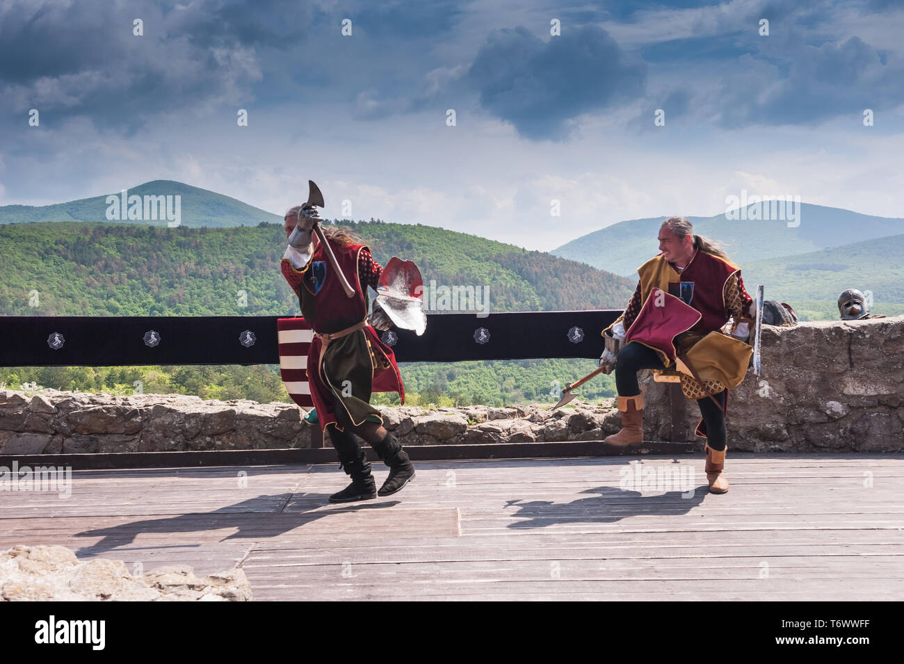 Knights fighting with axes in Castle Boldogkovaralja, Hungary Stock ...