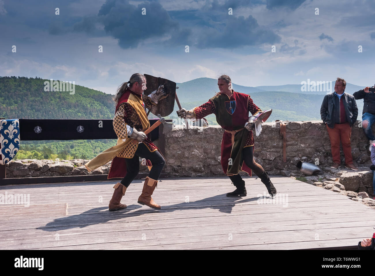 Knights fighting with axes in Castle Boldogkovaralja, Hungary Stock ...