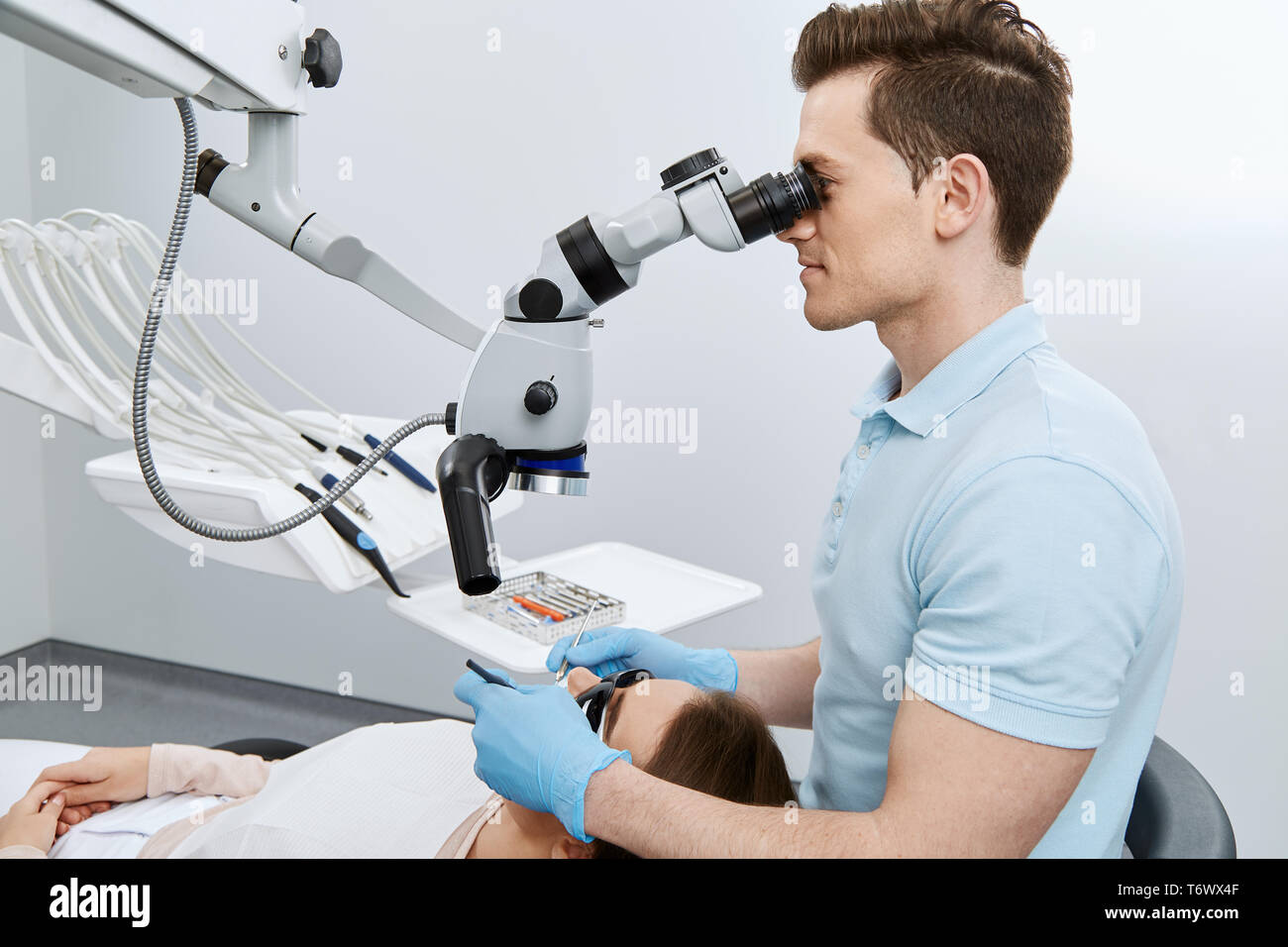 Working with microscope Stock Photo - Alamy