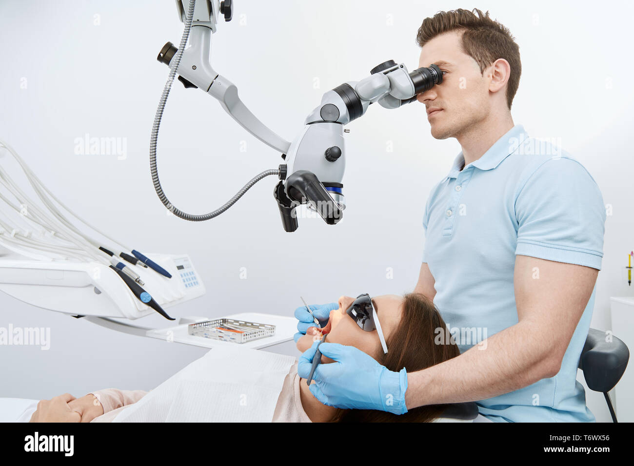 Working with microscope Stock Photo - Alamy