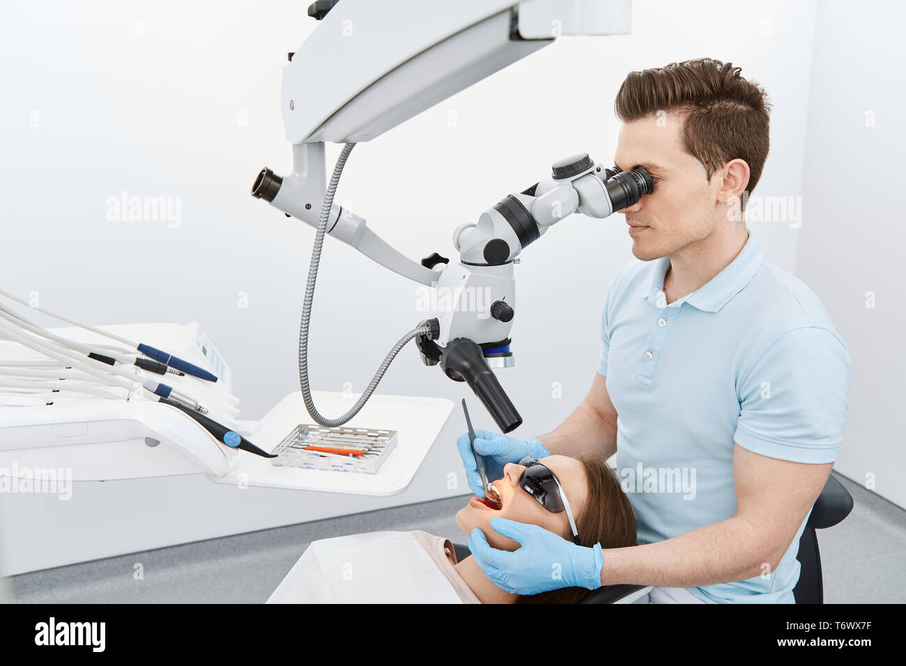 Working with microscope Stock Photo - Alamy