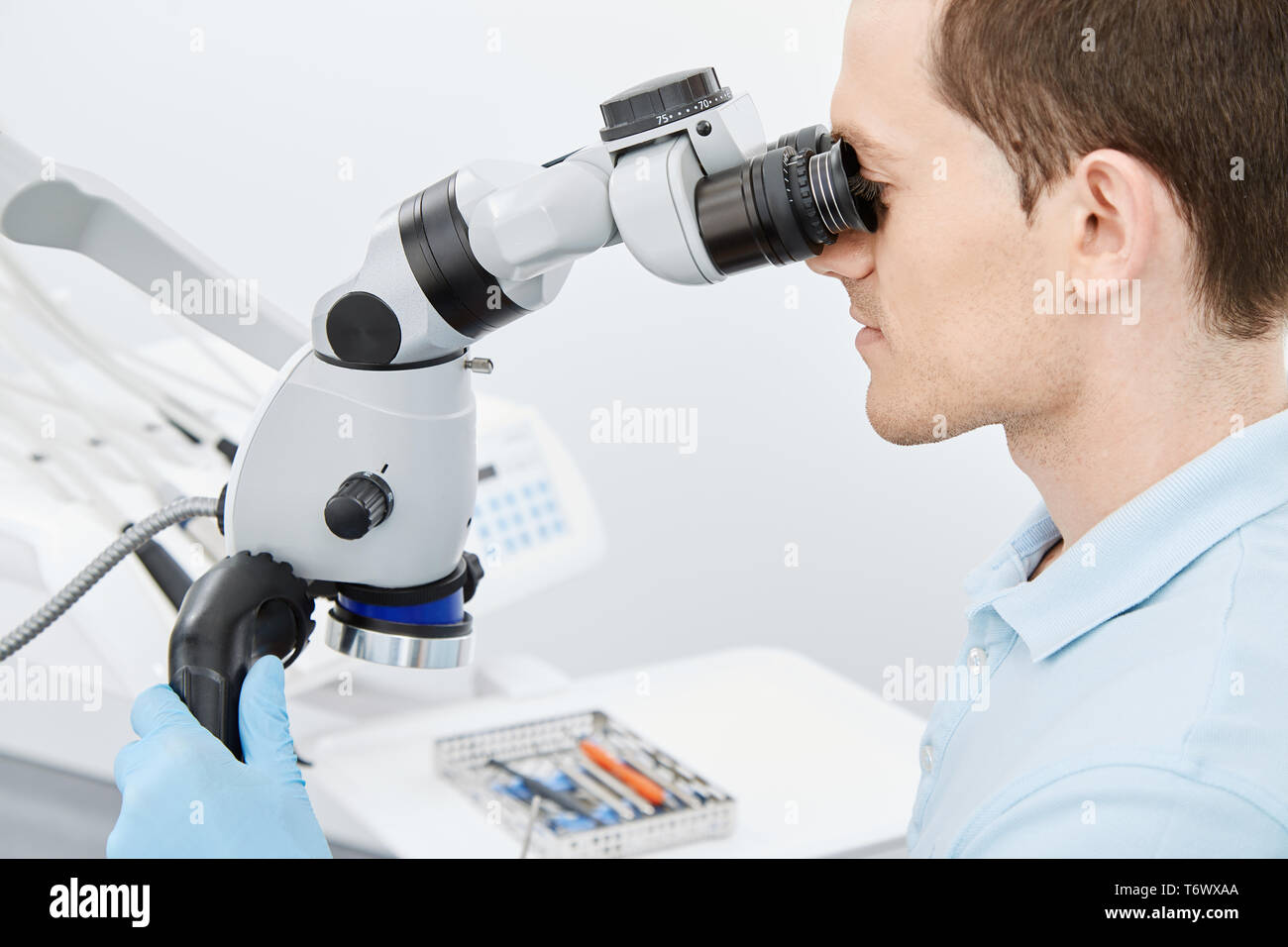 Working with microscope Stock Photo - Alamy