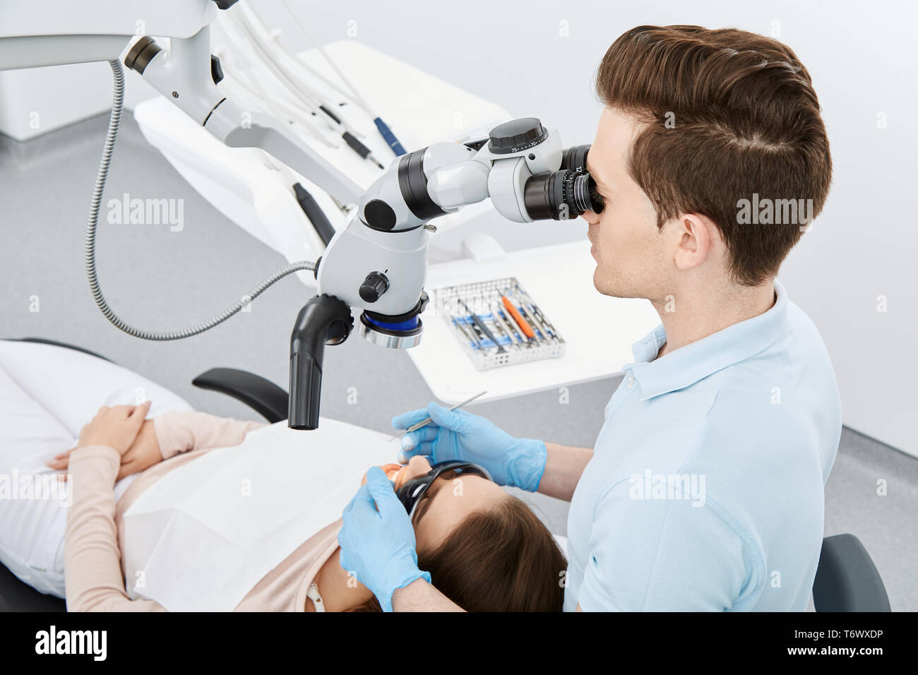 Working with microscope Stock Photo - Alamy