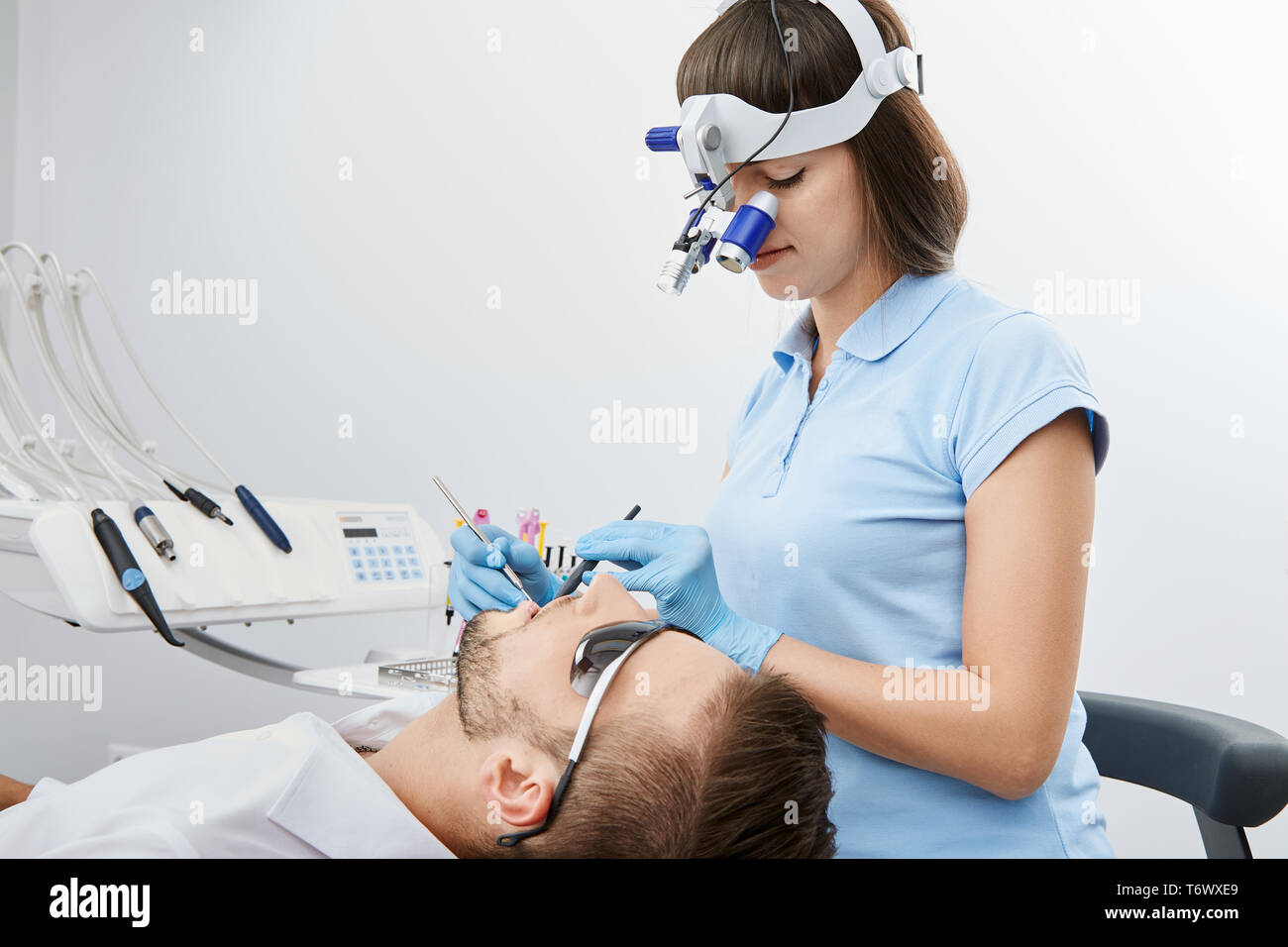 Working with microscope Stock Photo - Alamy