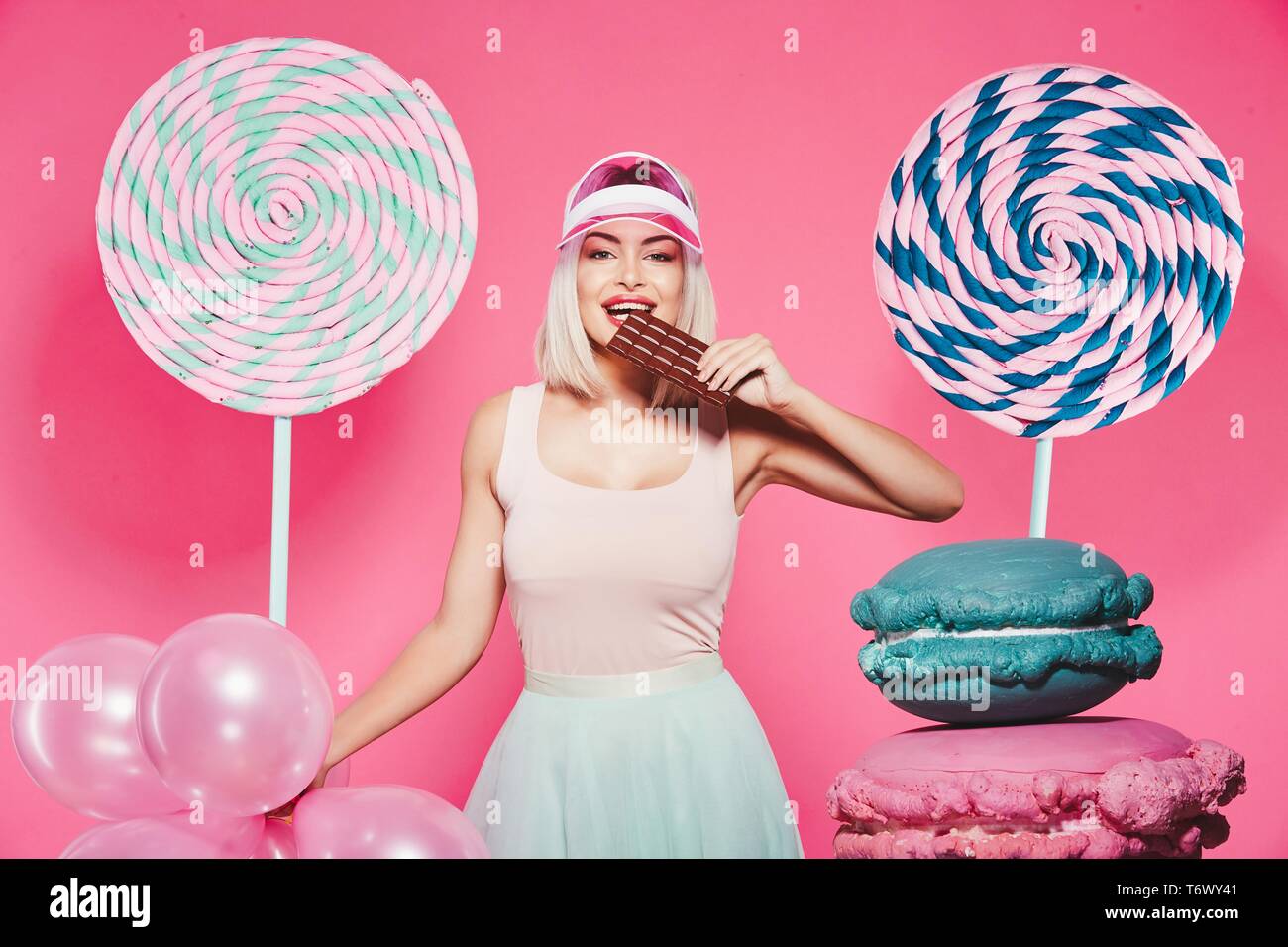 Attractive model with sweets Stock Photo - Alamy