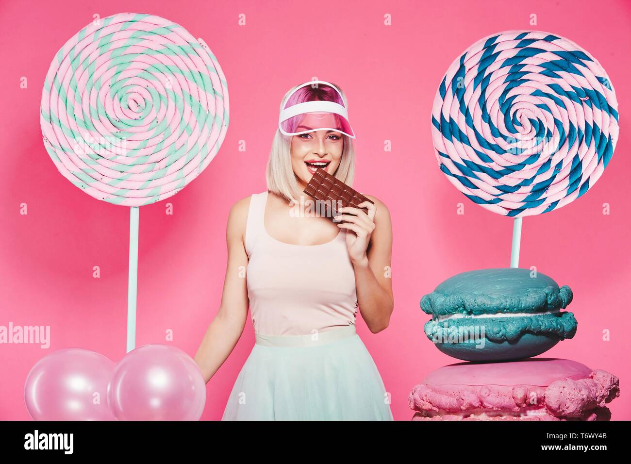 Attractive model with sweets Stock Photo - Alamy