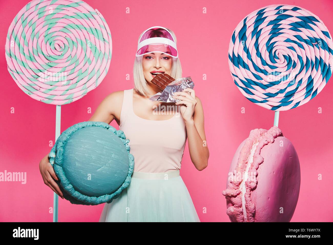 Attractive model with sweets Stock Photo - Alamy