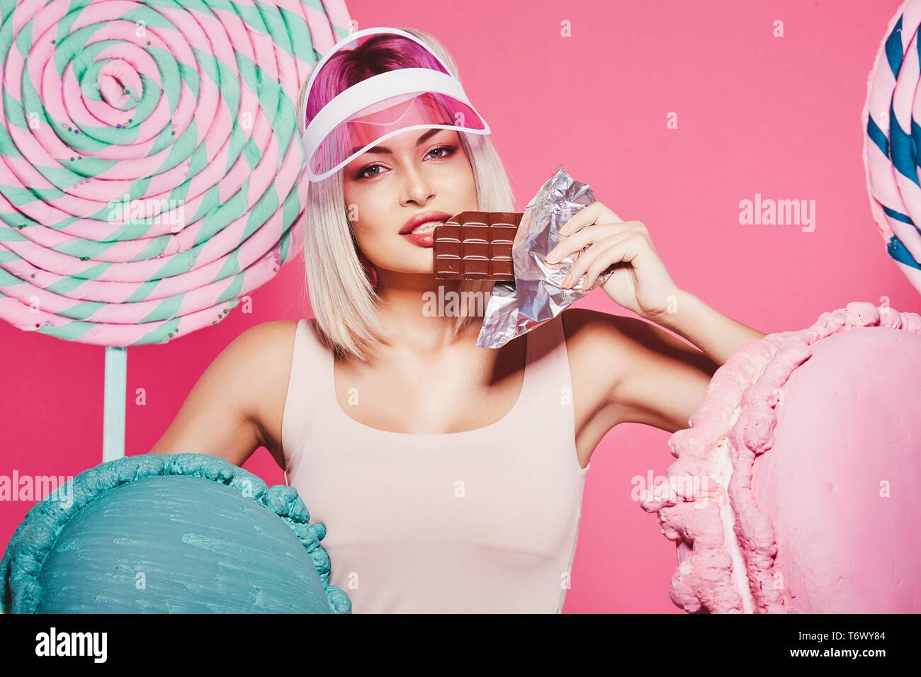 Attractive model with sweets Stock Photo - Alamy