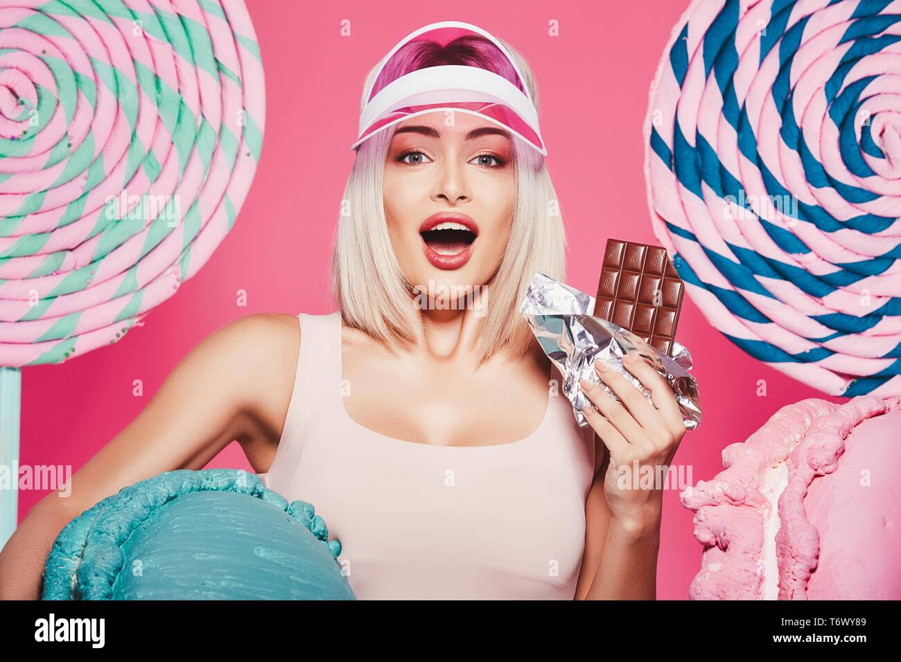 Attractive model with sweets Stock Photo - Alamy
