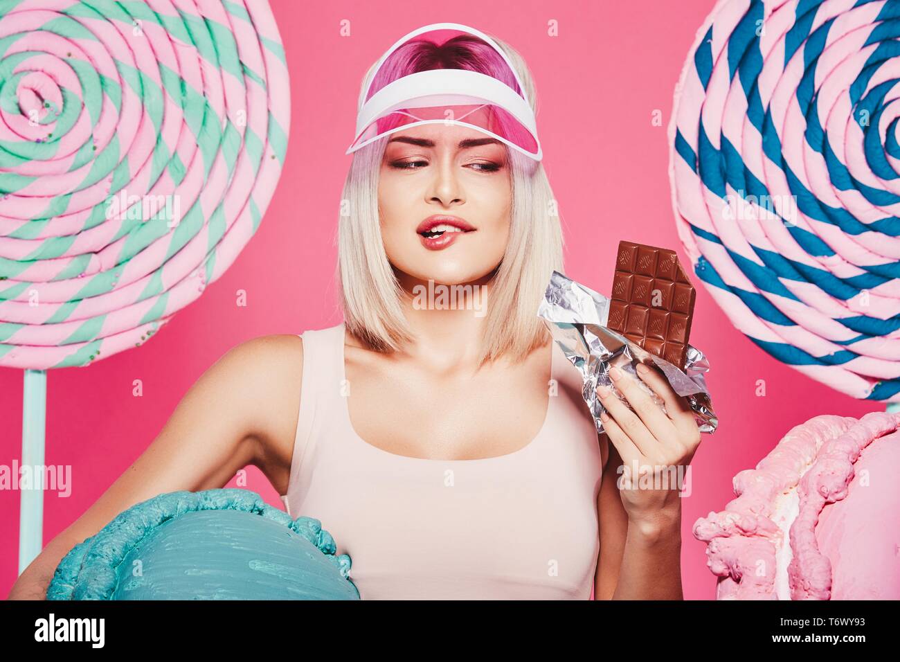 Attractive model with sweets Stock Photo - Alamy