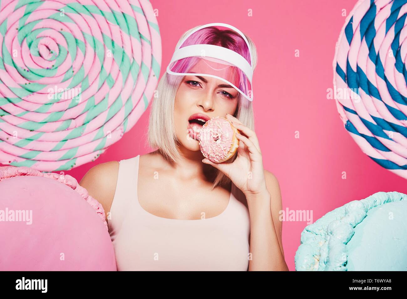 Attractive model with sweets Stock Photo - Alamy