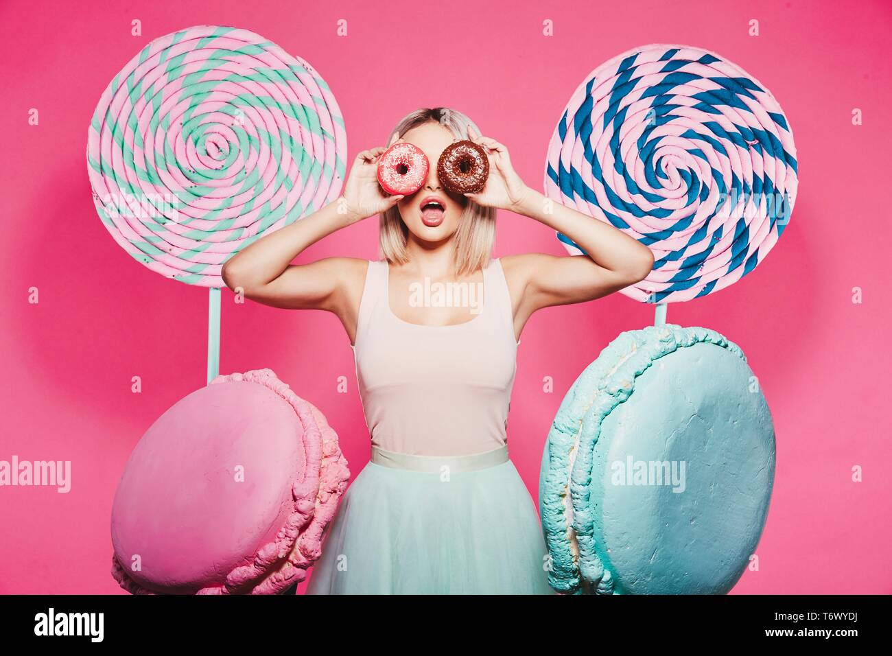 Attractive model with sweets Stock Photo - Alamy