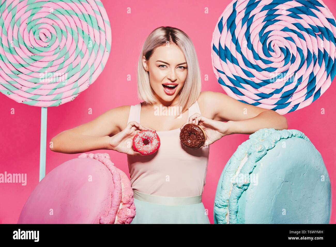Attractive model with sweets Stock Photo - Alamy