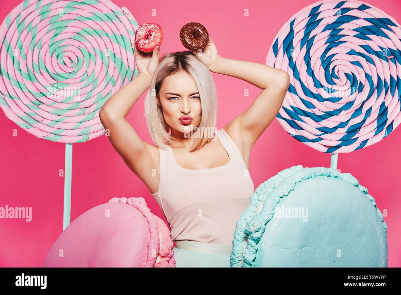 Attractive model with sweets Stock Photo - Alamy