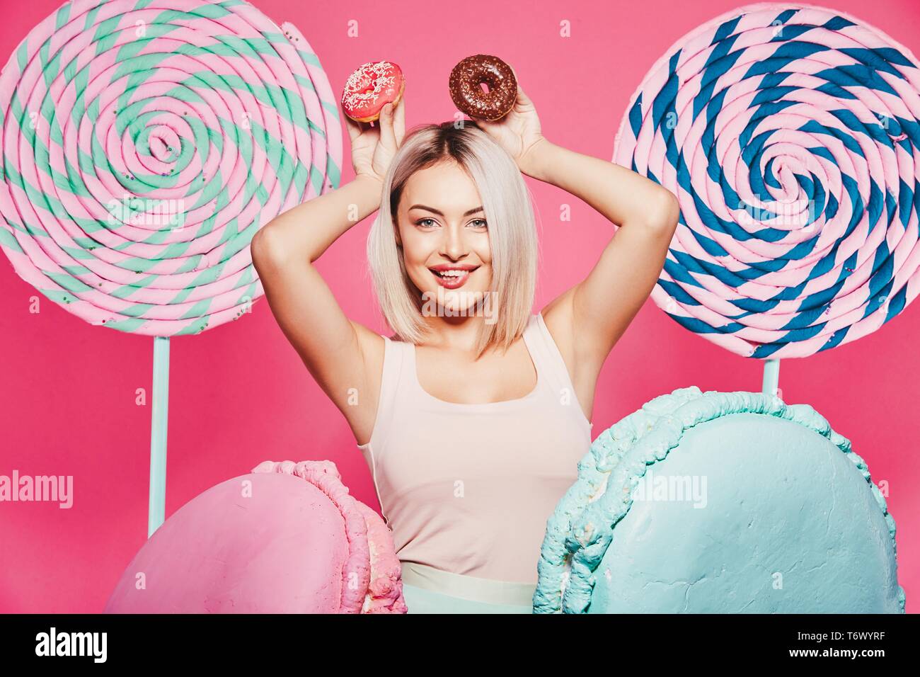 Attractive model with sweets Stock Photo - Alamy