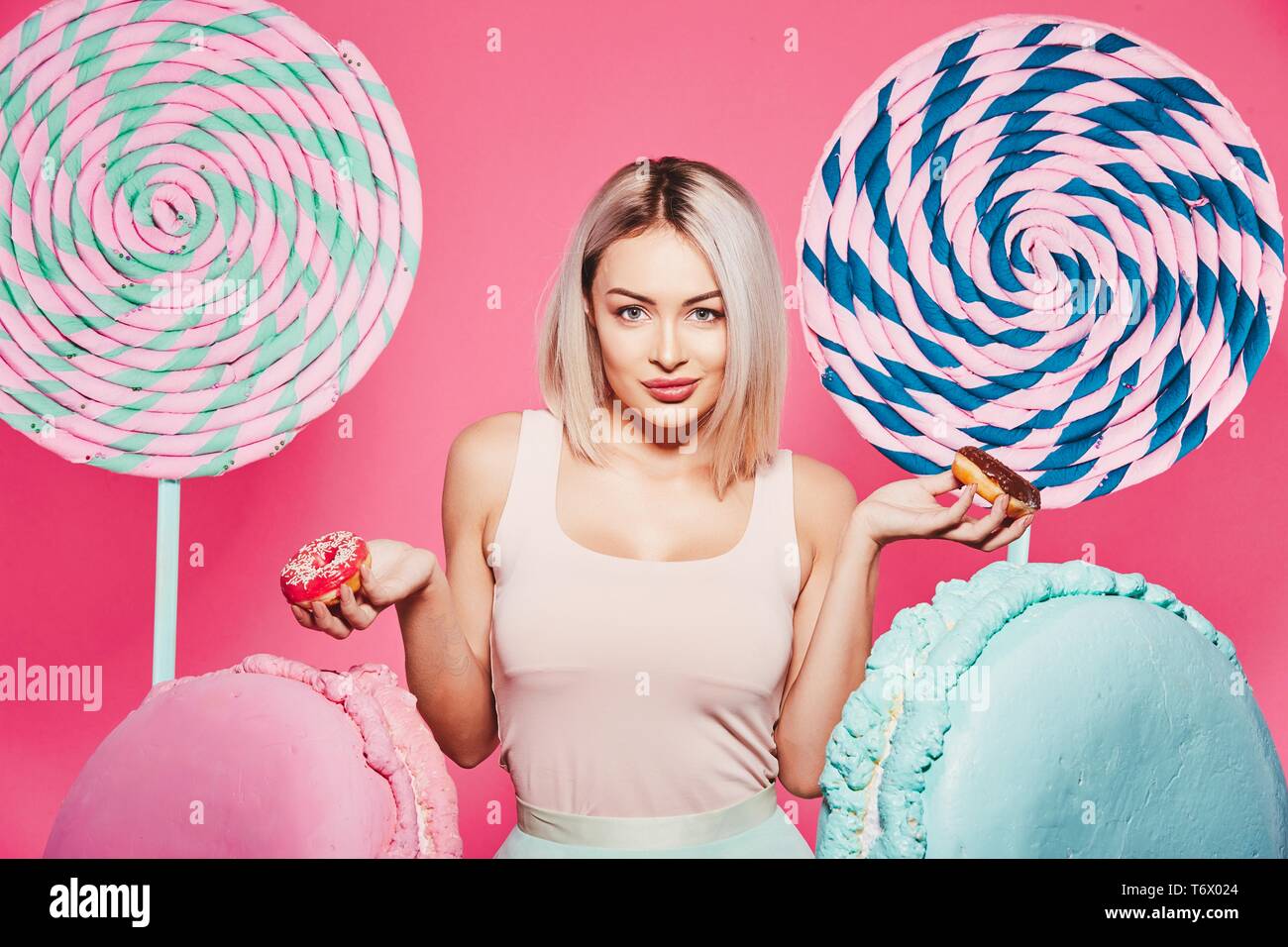 Attractive model with sweets Stock Photo - Alamy