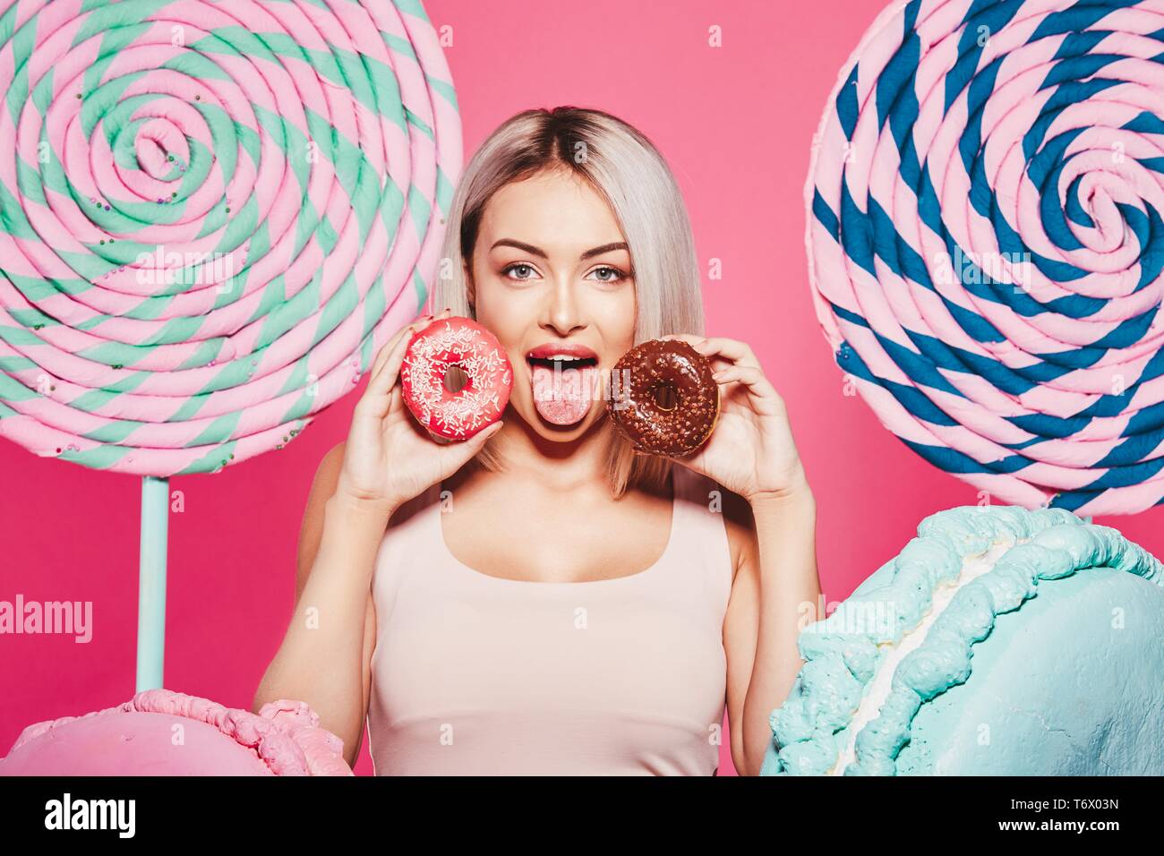 Attractive model with sweets Stock Photo - Alamy