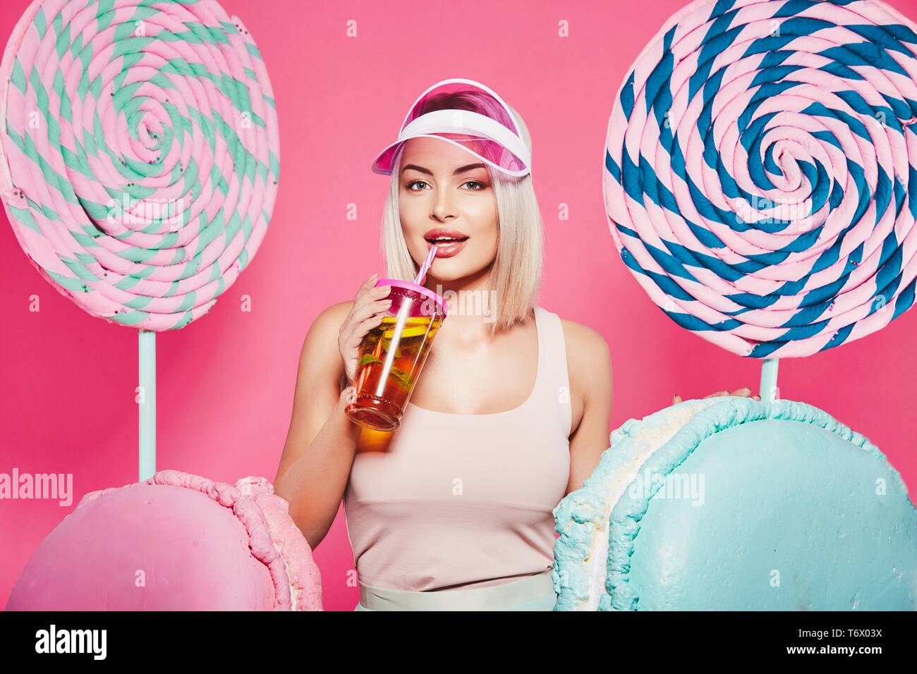 Attractive model with sweets Stock Photo - Alamy