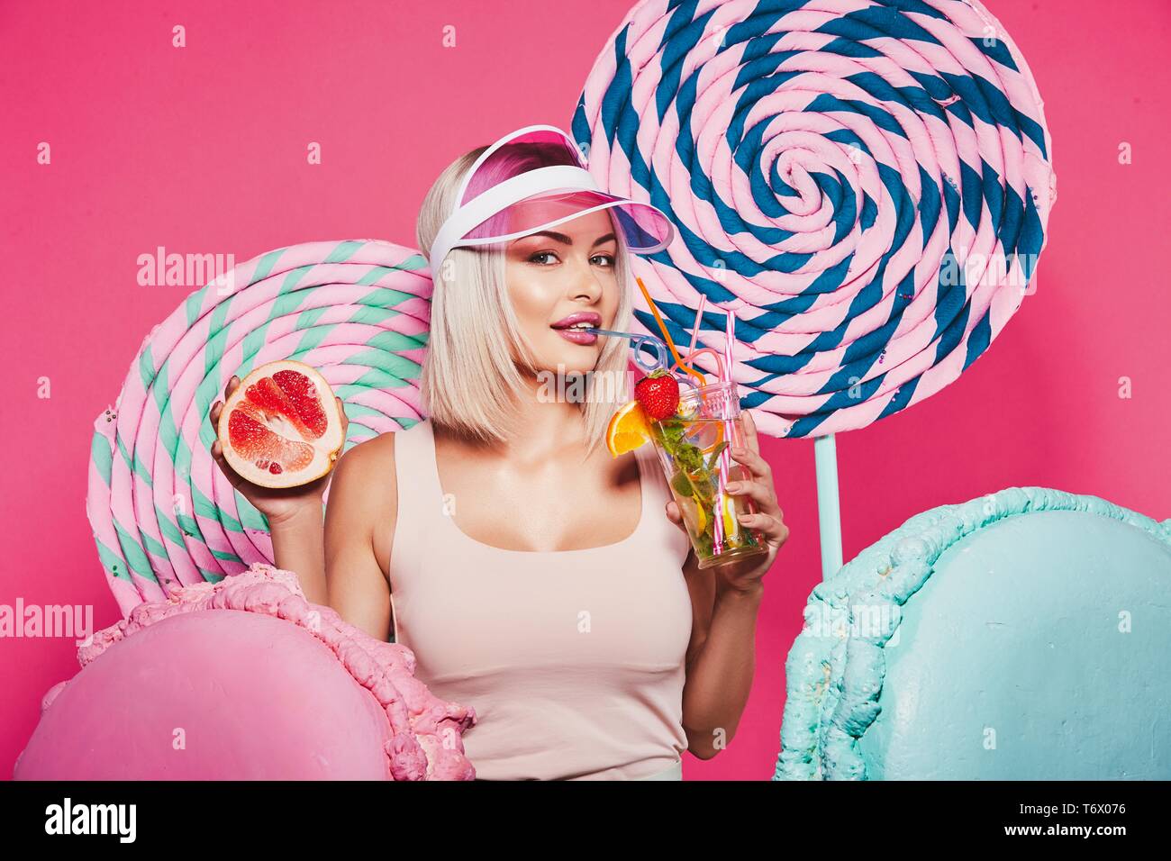 Attractive model with sweets Stock Photo - Alamy