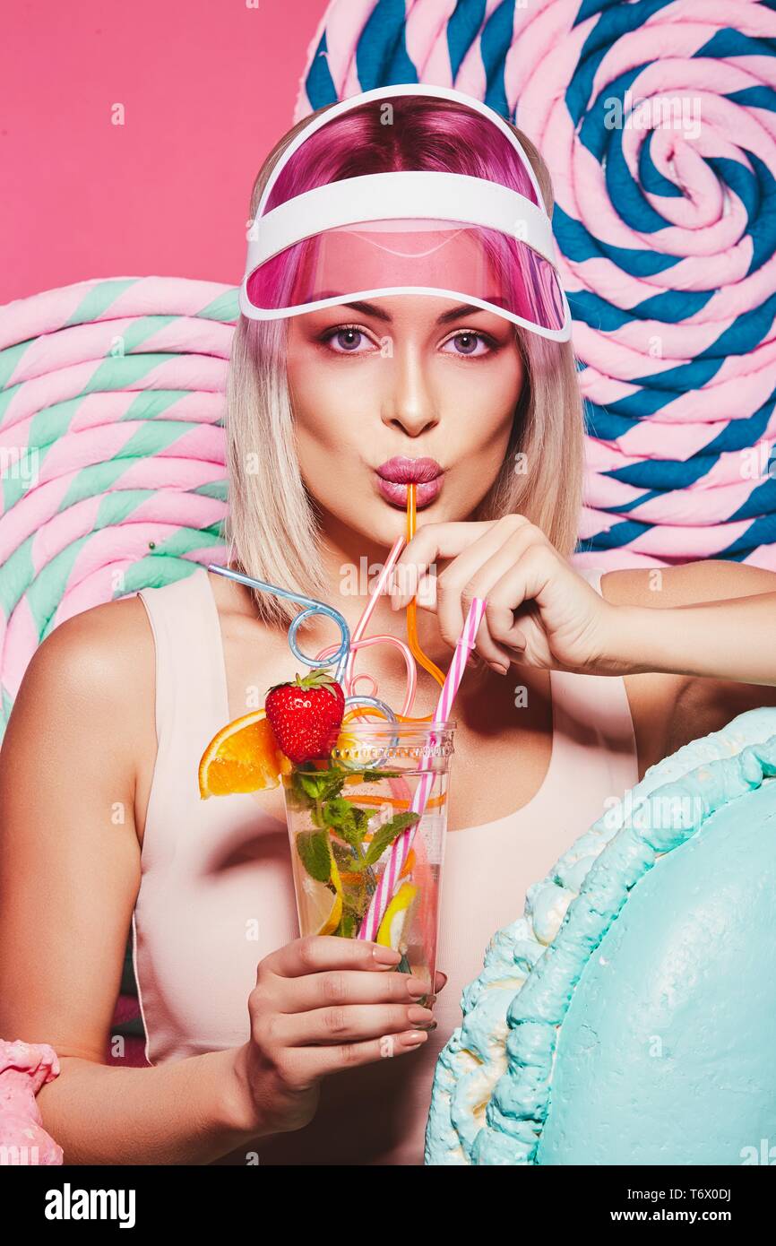 Cute model with sweets Stock Photo - Alamy