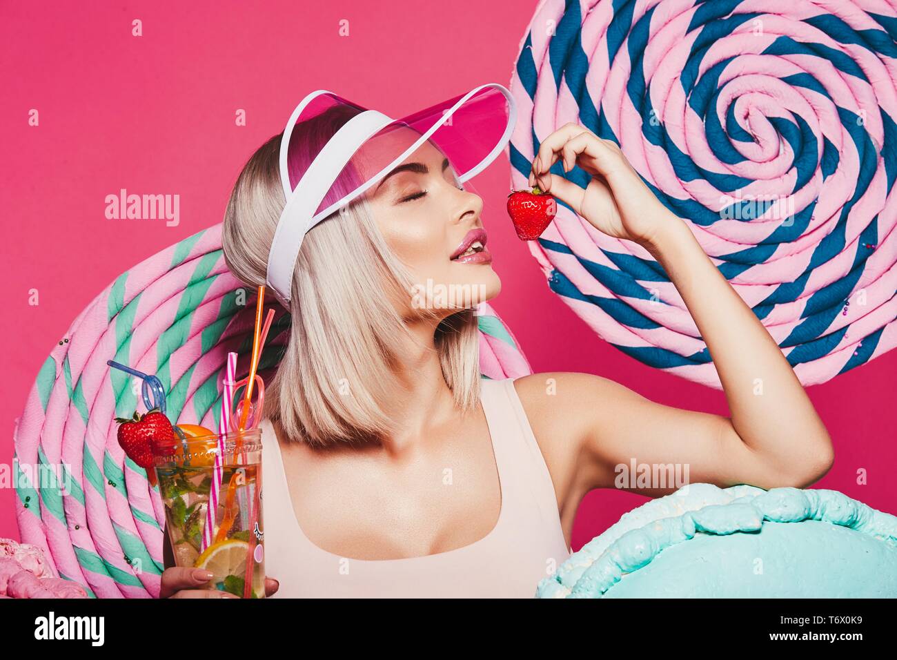 Attractive model with sweets Stock Photo - Alamy