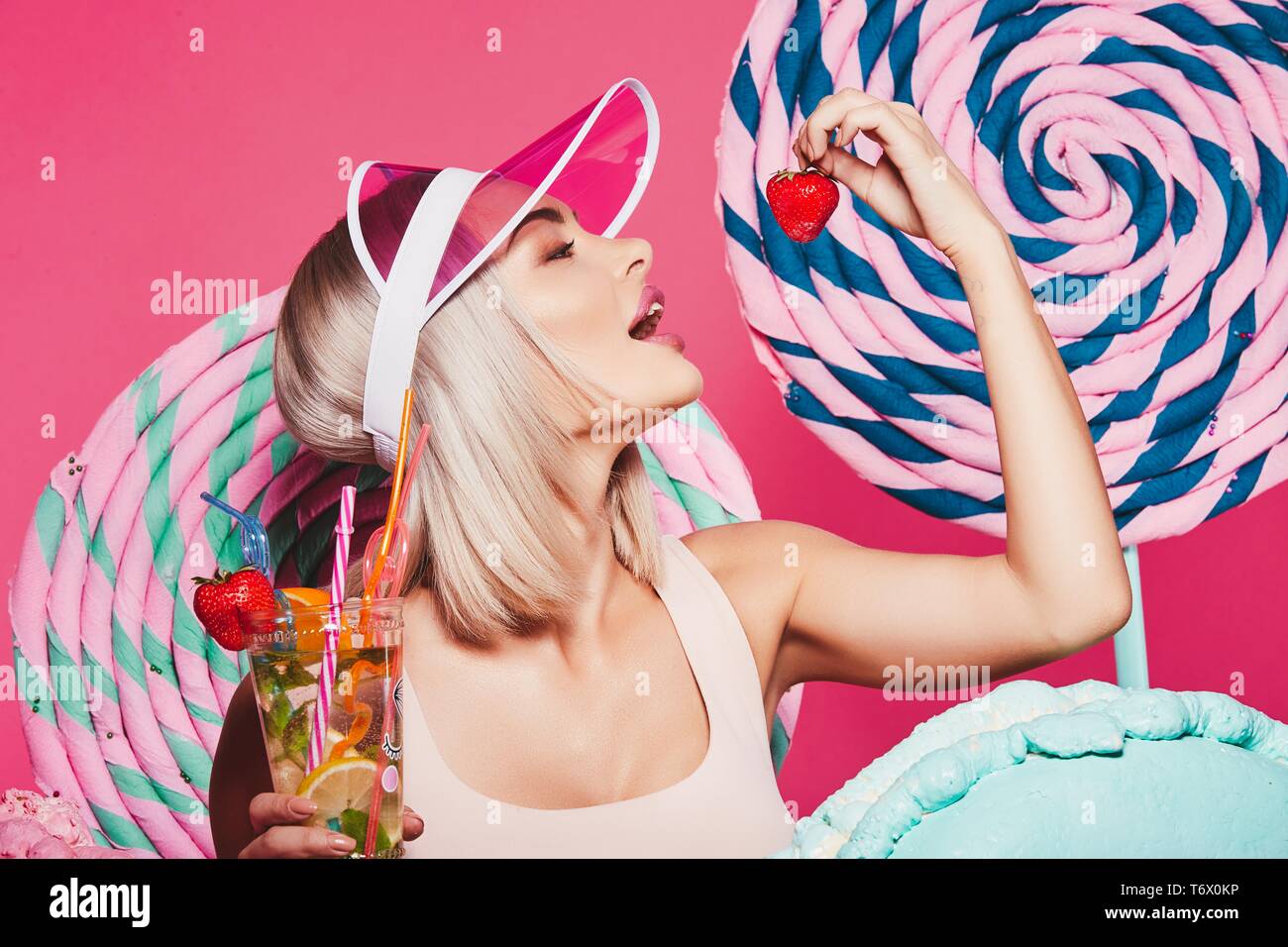 Cute model with sweets Stock Photo - Alamy