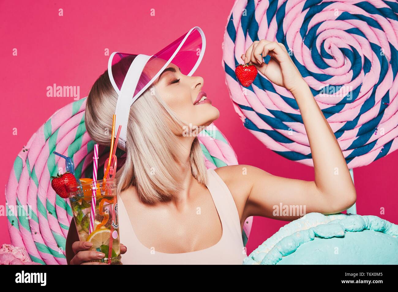 Attractive model with sweets Stock Photo - Alamy