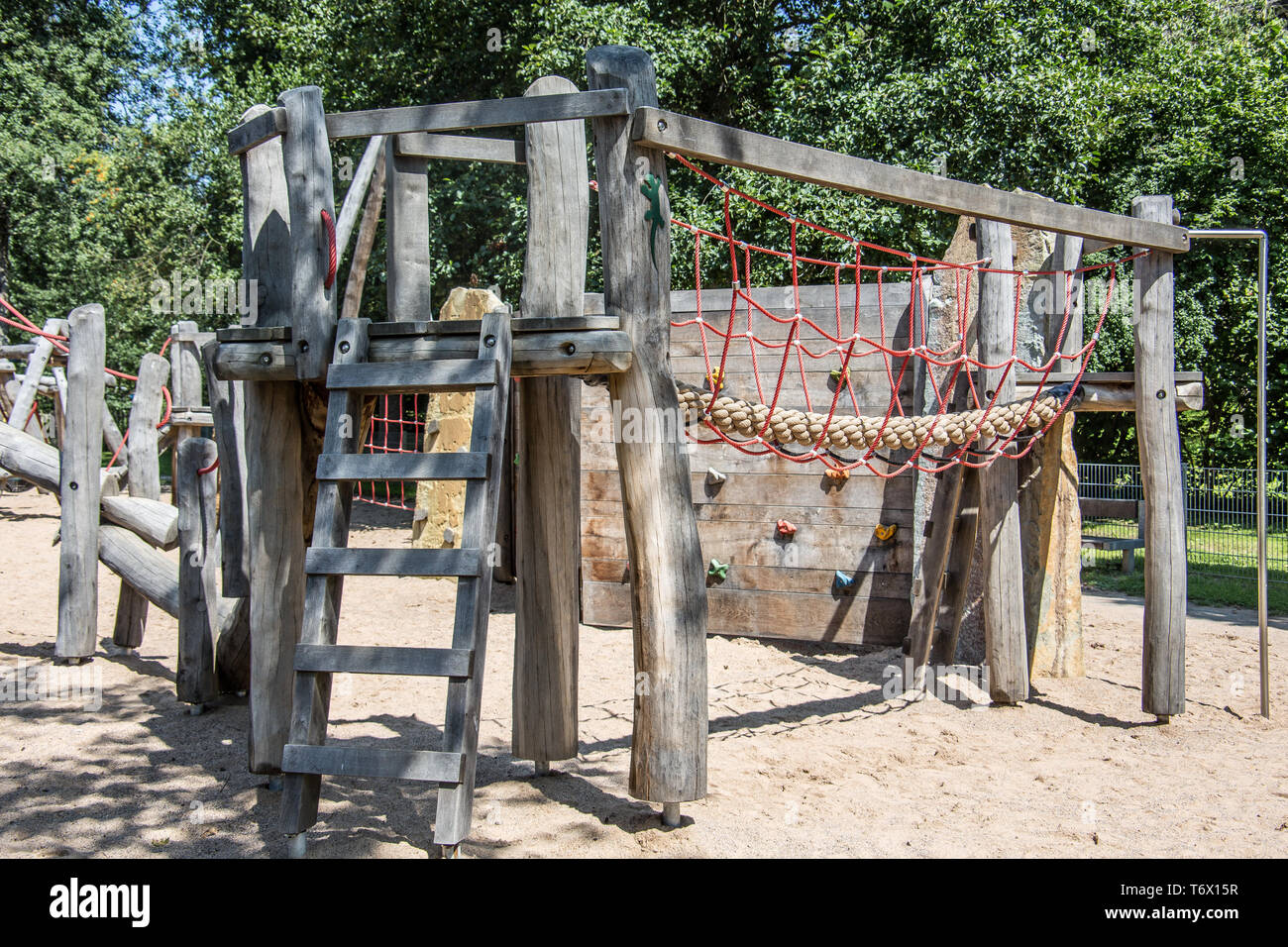 Adventure playground with climbing frame Stock Photo - Alamy