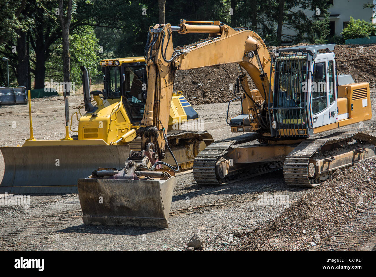 Construction machinery on construction site Stock Photo - Alamy