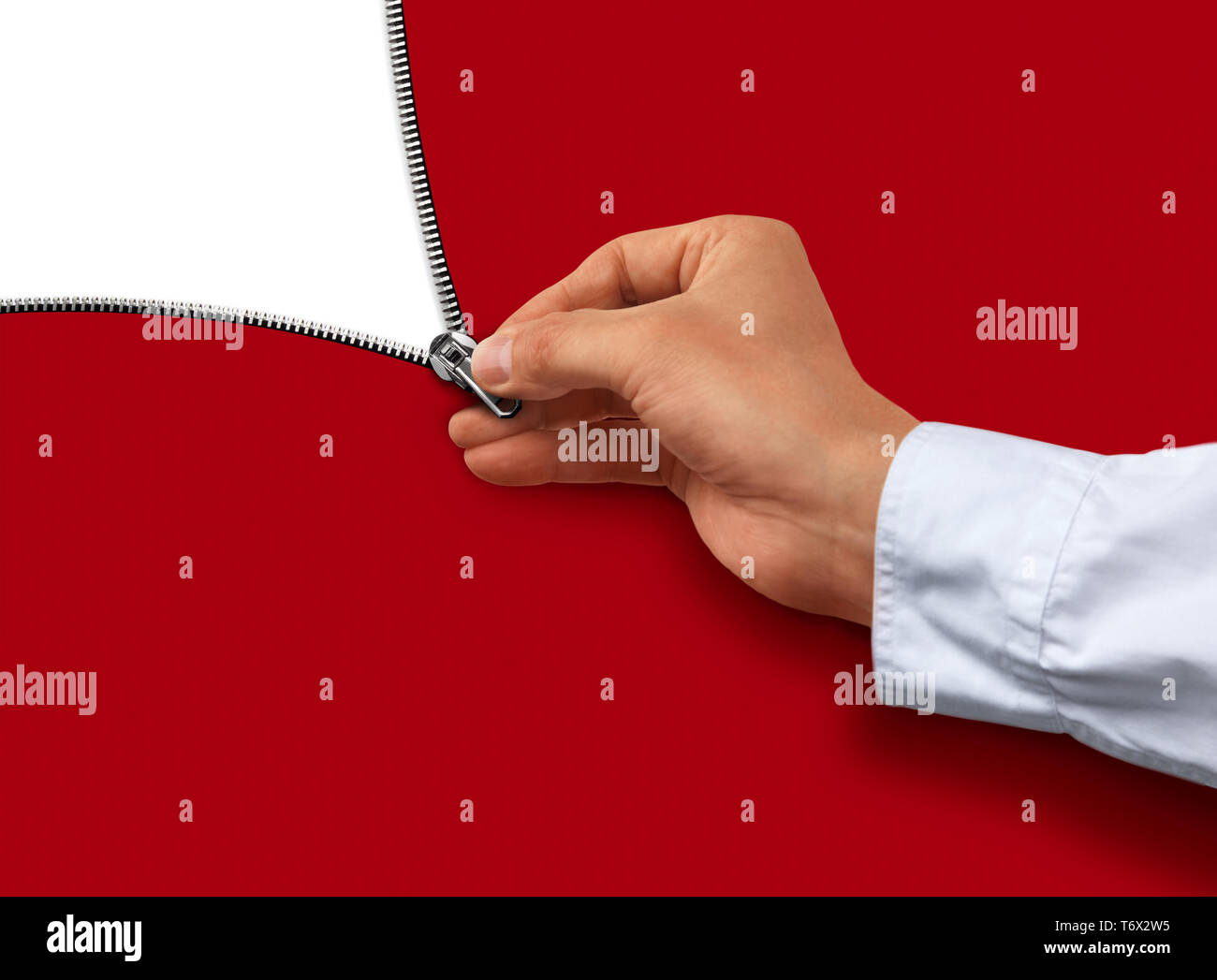 Hand opens zipper Stock Photo - Alamy