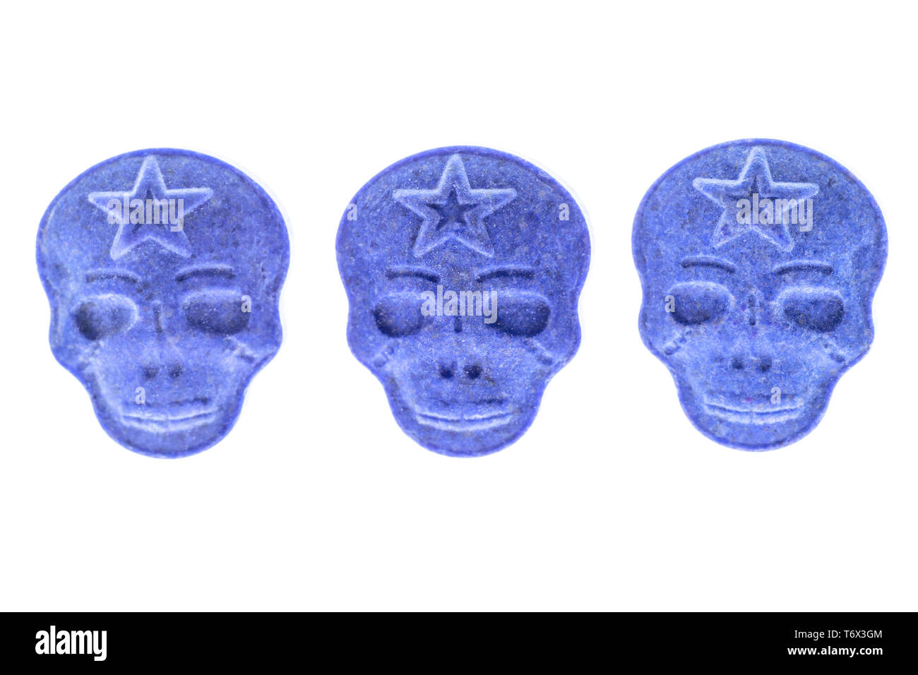 Three blue Army Skull, Ecstasy, MDMA, Amphetamine or medication pills ...
