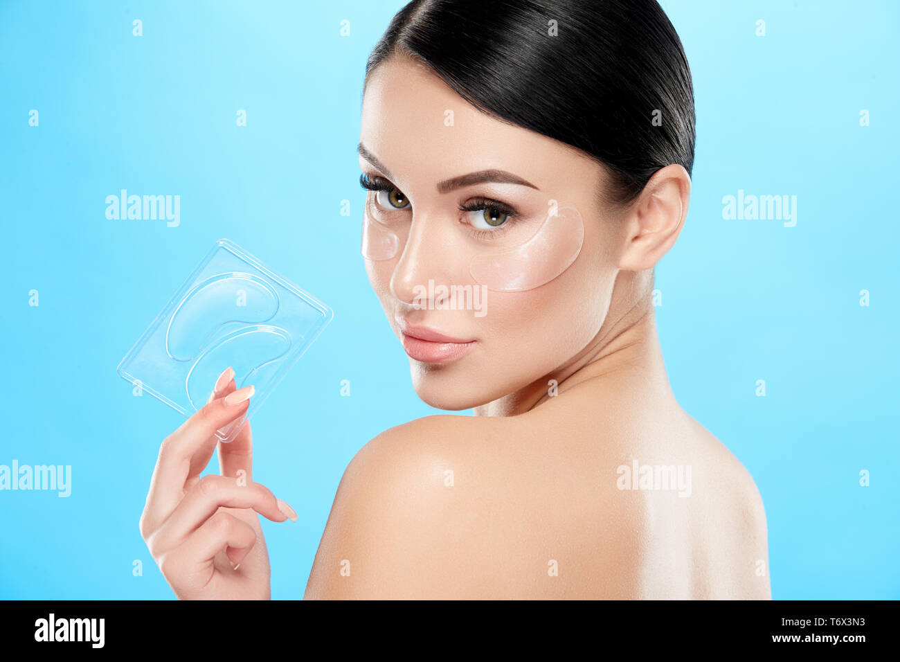 Pretty girl with patches on face Stock Photo - Alamy