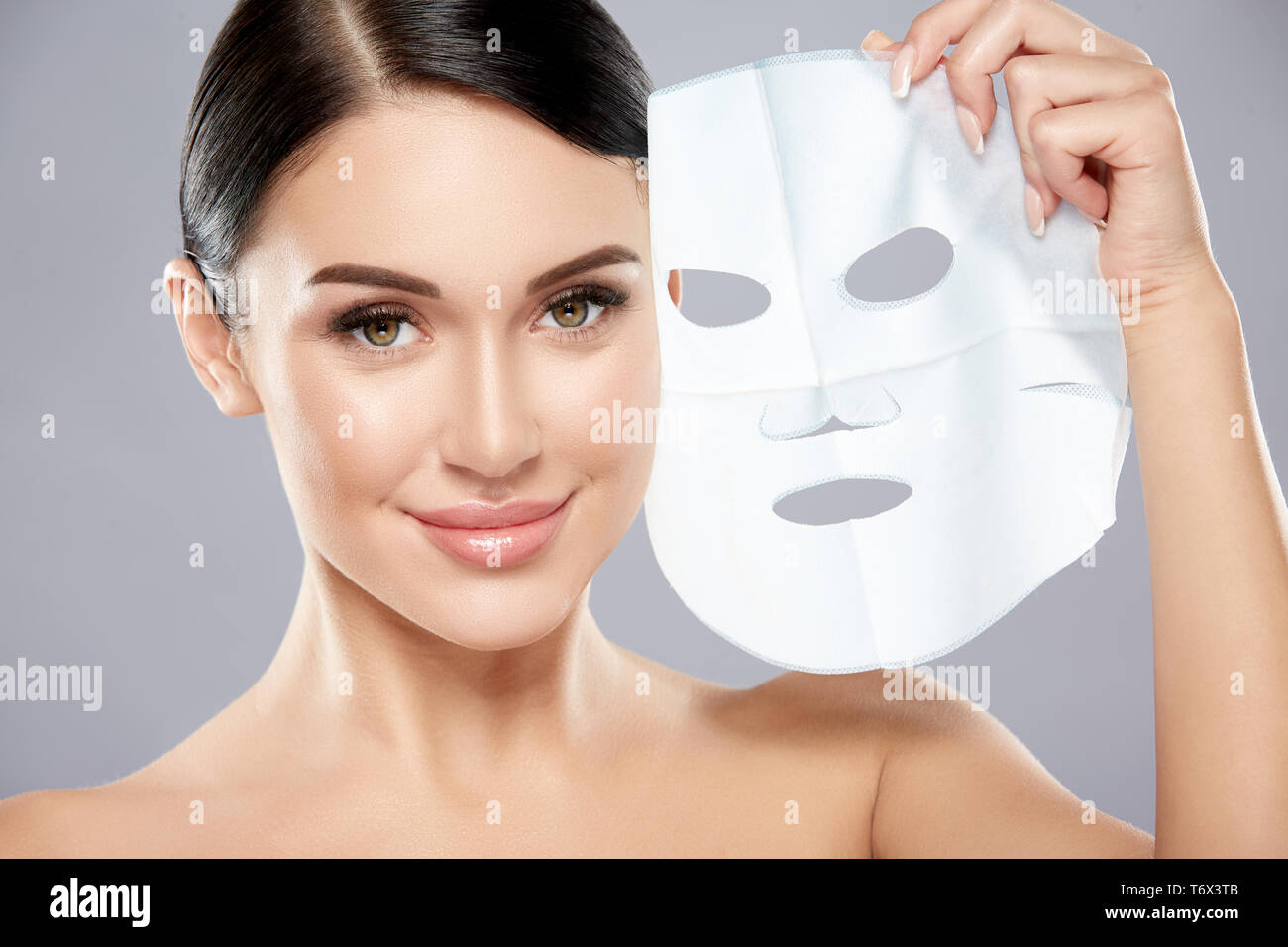 Using facial mask Stock Photo - Alamy