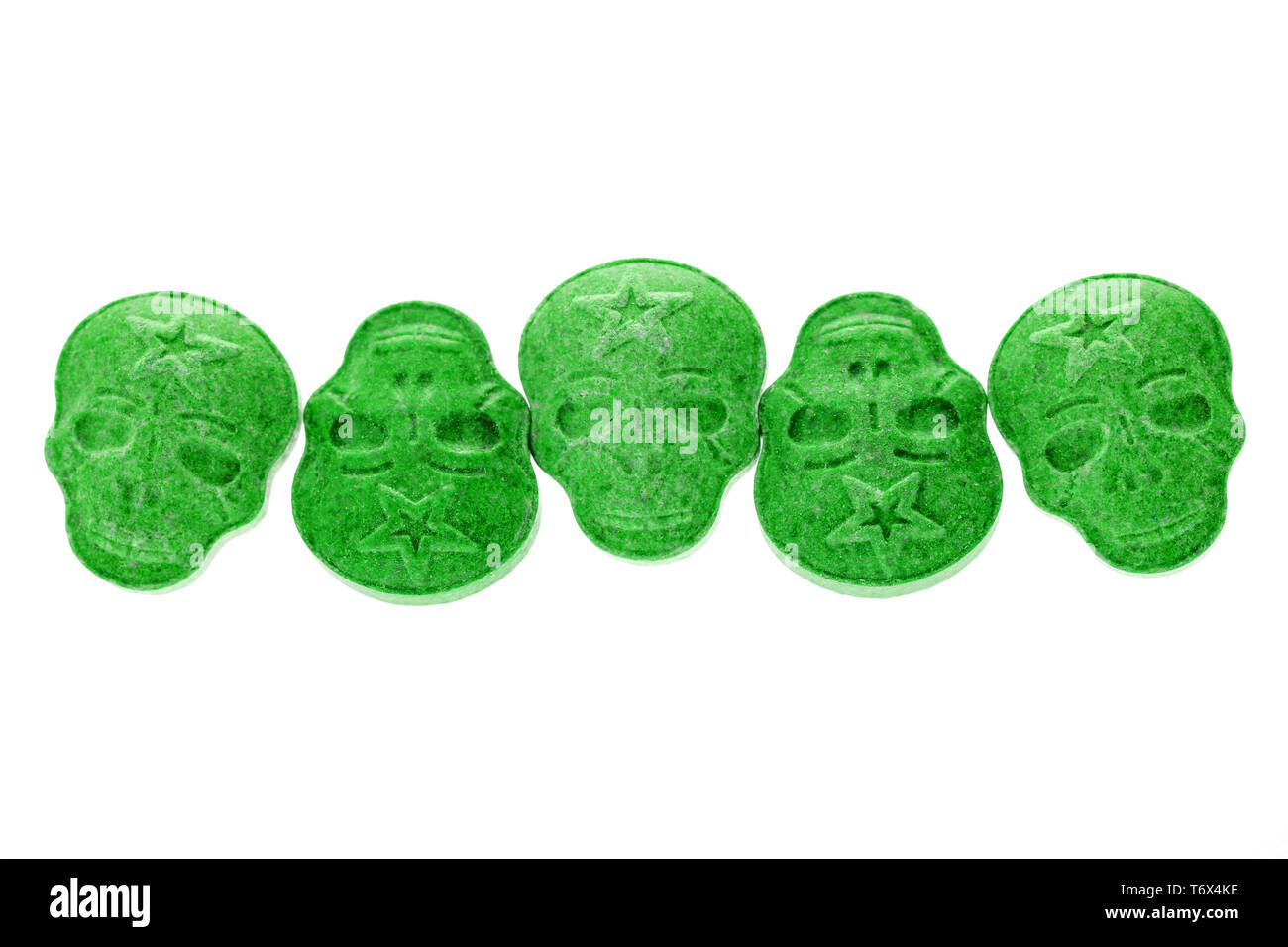 Five green army Skull, Ecstasy, MDMA, Amphetamine or medication pills ...