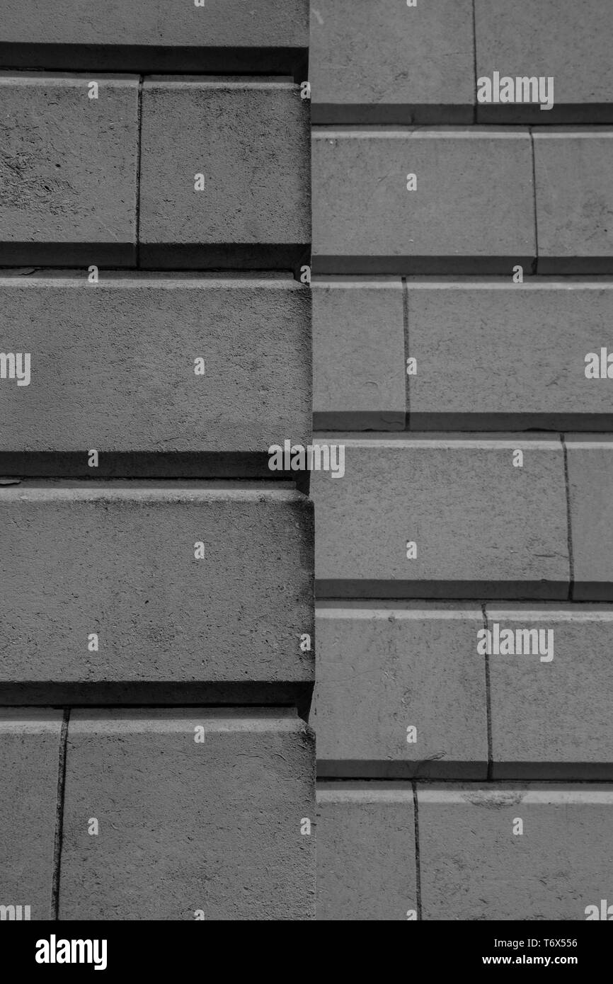 Close up of a section of a wall showing grey brick pattern Stock Photo ...