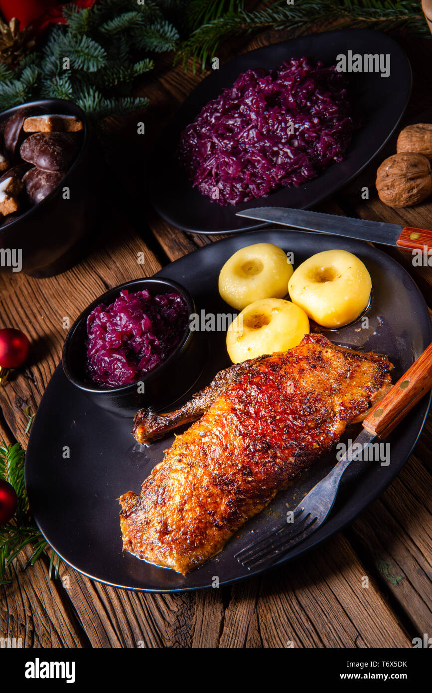classic and crispy roasted duck with cabbage and dumplings Stock Photo ...
