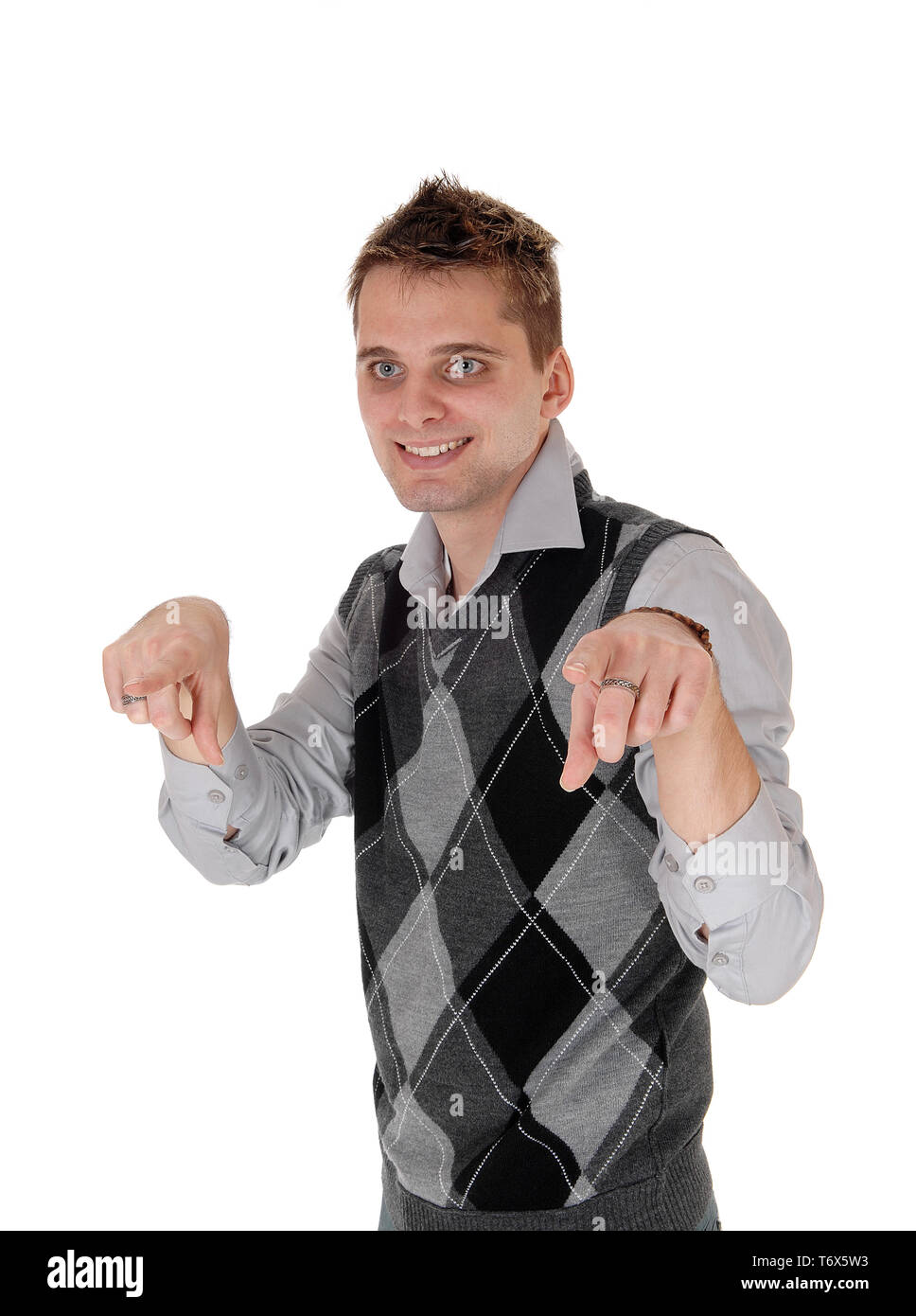 Young man pointing finger at the camera Stock Photo - Alamy