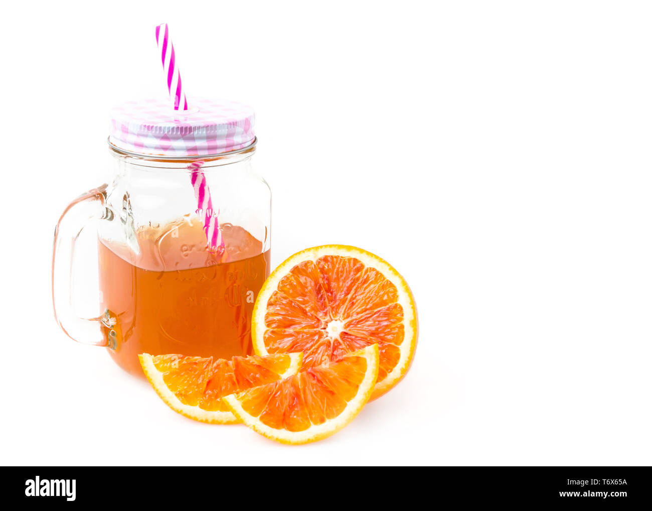 Orange tea in mason jar Stock Photo - Alamy