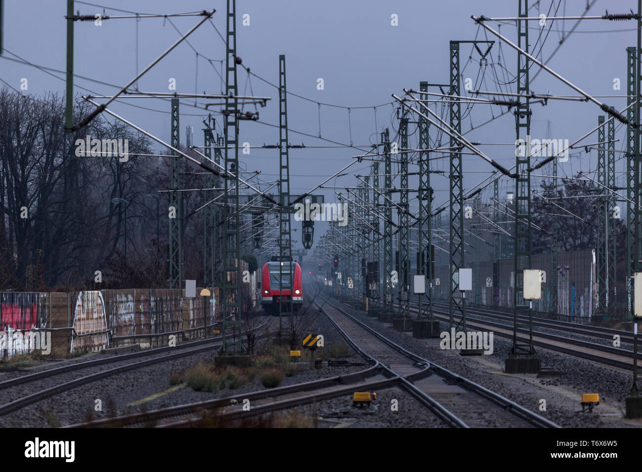 railway tracks background with incoming train Stock Photo - Alamy