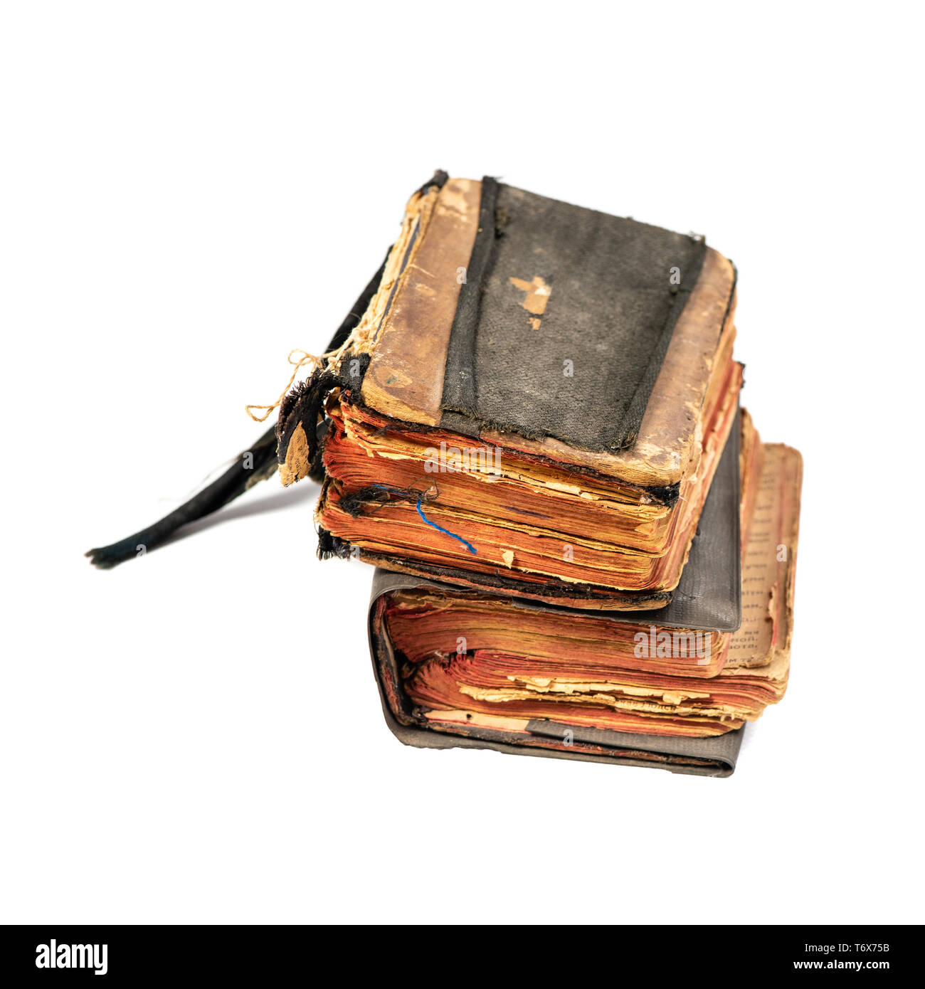 Two ancient prayer books, angle wise. Objects isolated on white ...