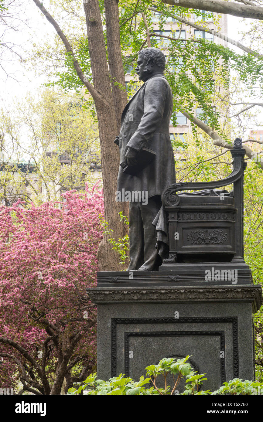 Chester A. Arthur Statue is surrounded by beautiful spring flowering ...