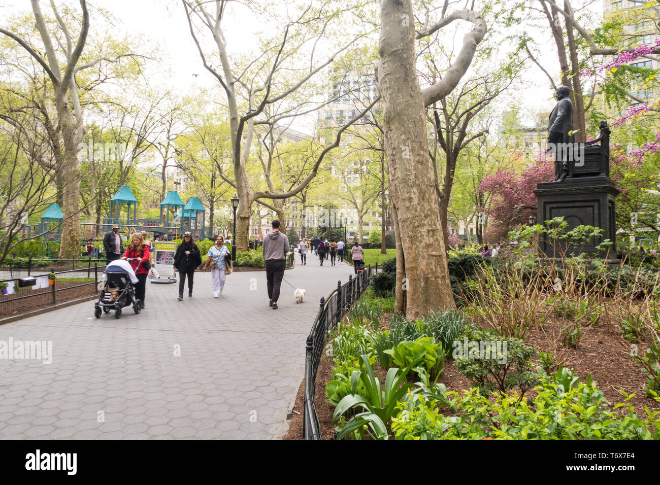 Chester A. Arthur Statue is surrounded by beautiful spring flowering ...