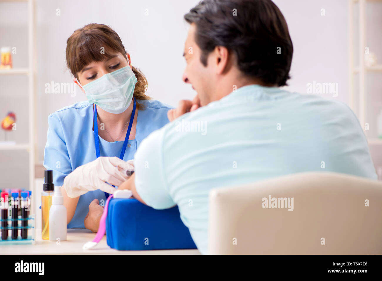 Young patient during blood test sampling procedure Stock Photo - Alamy