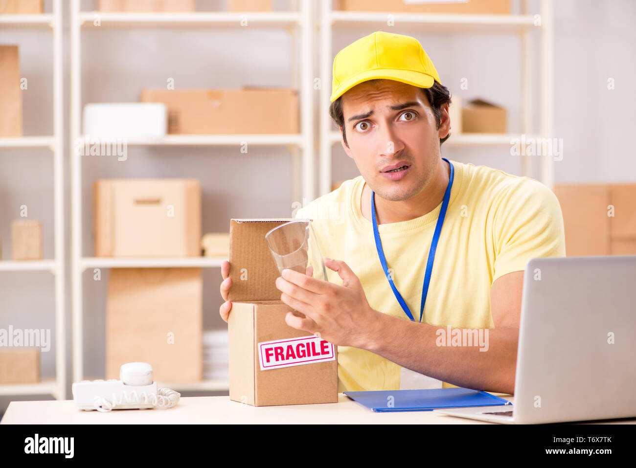 Handsome contractor working in box delivery relocation service Stock ...