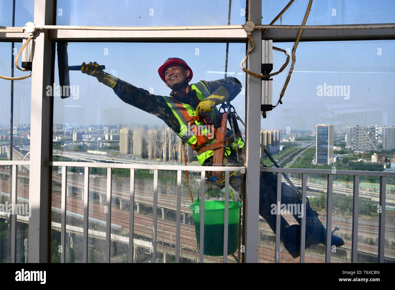 Zhengzhou, China's Henan Province. 2nd May, 2019. A worker cleans the ...