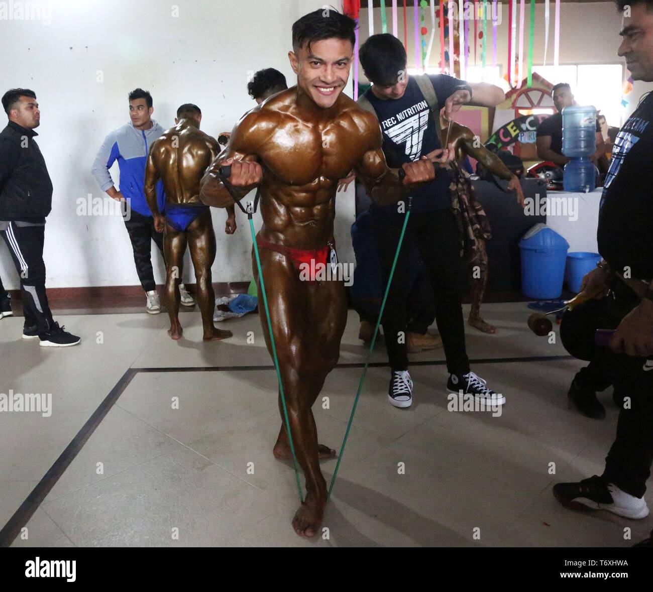 Kathmandu. 3rd May, 2019. A Nepalese bodybuilder gets ready for the pre ...