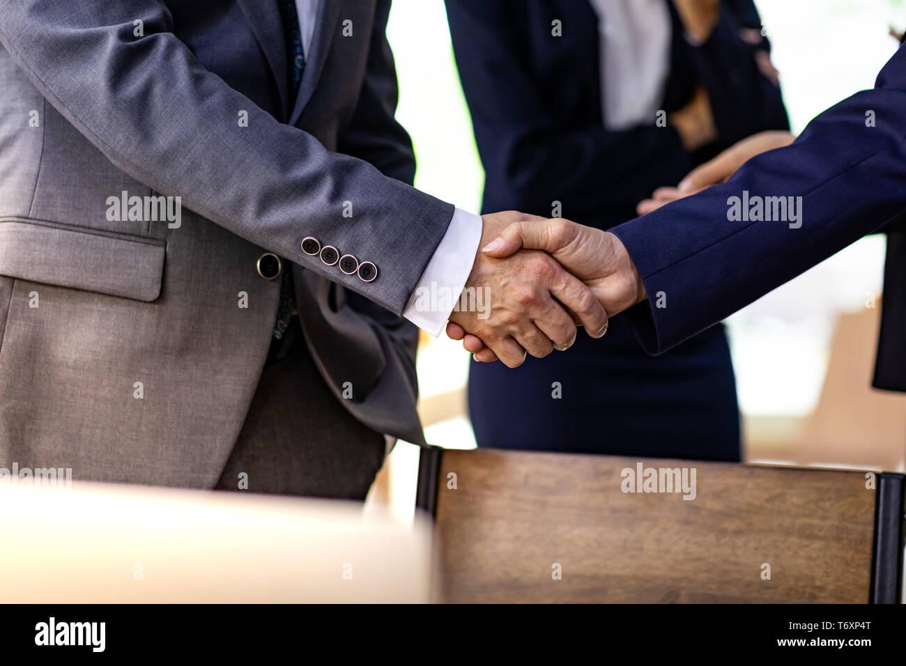 Business deal Handshake Stock Photo - Alamy